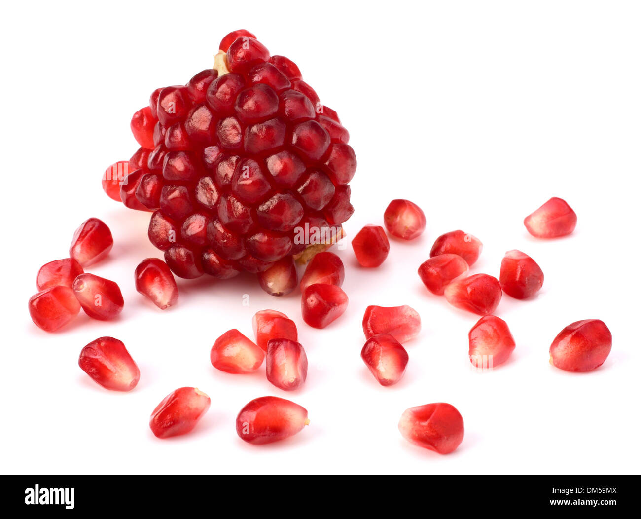Ripe pomegranate piece isolated on white background Stock Photo - Alamy