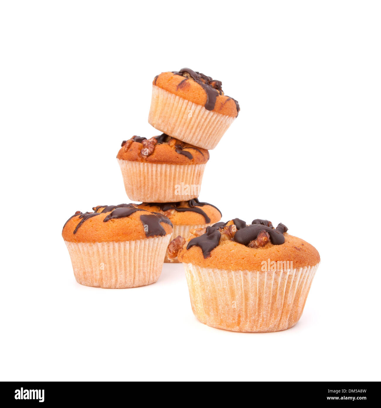 Stacked muffins isolated on white background Stock Photo - Alamy