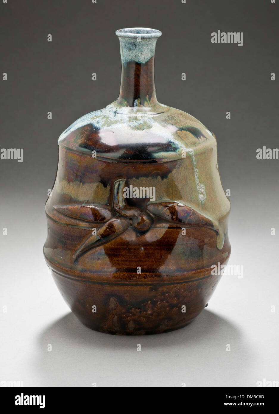 This bamboo-shaped sake bottle (tokkuri) is crafted using traditional ...