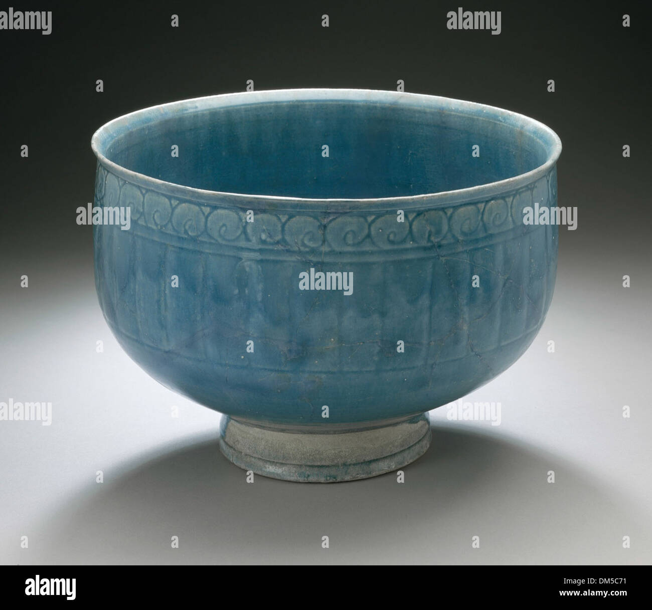 This basin is a functional and decorative object, likely used for ...