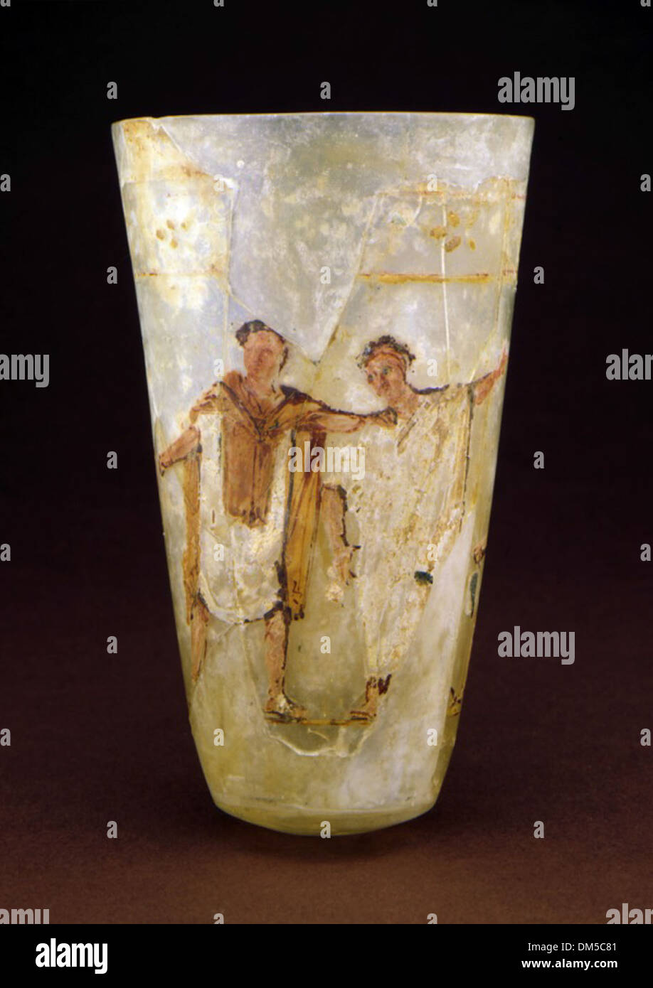 This beaker depicts a theatrical scene, capturing a moment from a ...