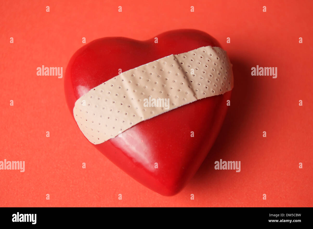 Broken heart that has been wounded Stock Photo - Alamy