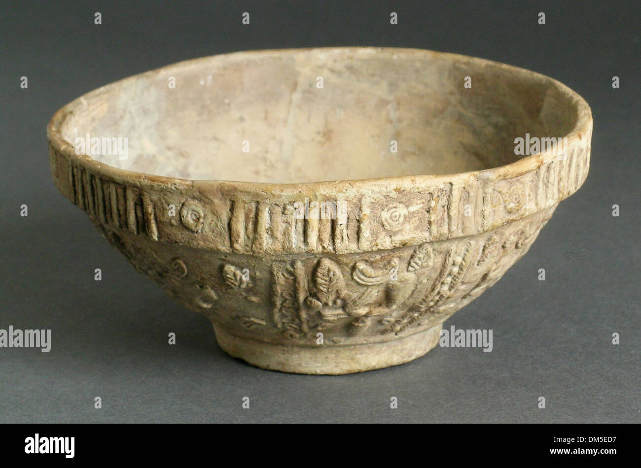 This ceramic bowl showcases a balanced design with simple, clean lines ...