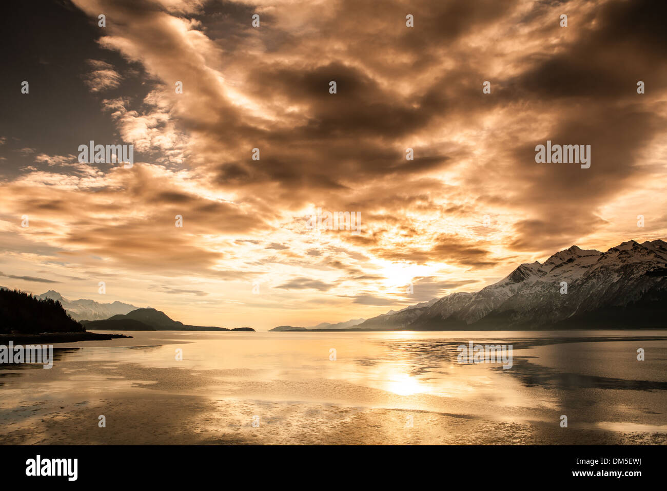 Sunset over the scenic Chilkat Inlet in Southeat Alaska with snow ...