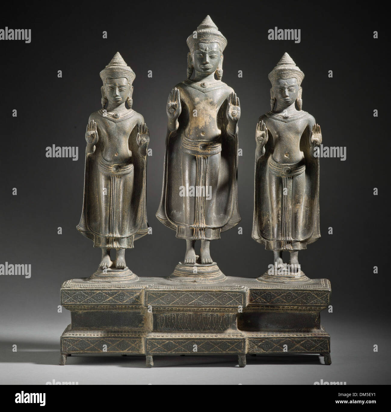 This Buddhist triad features three figures representing important ...