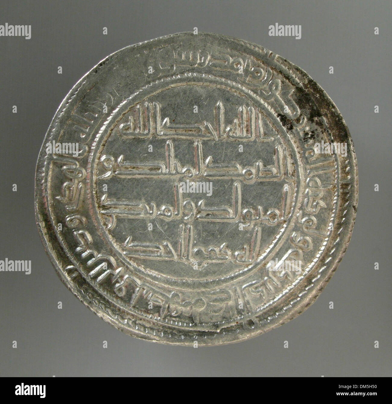 This dirham is a historical Islamic coin, often used for trade and ...