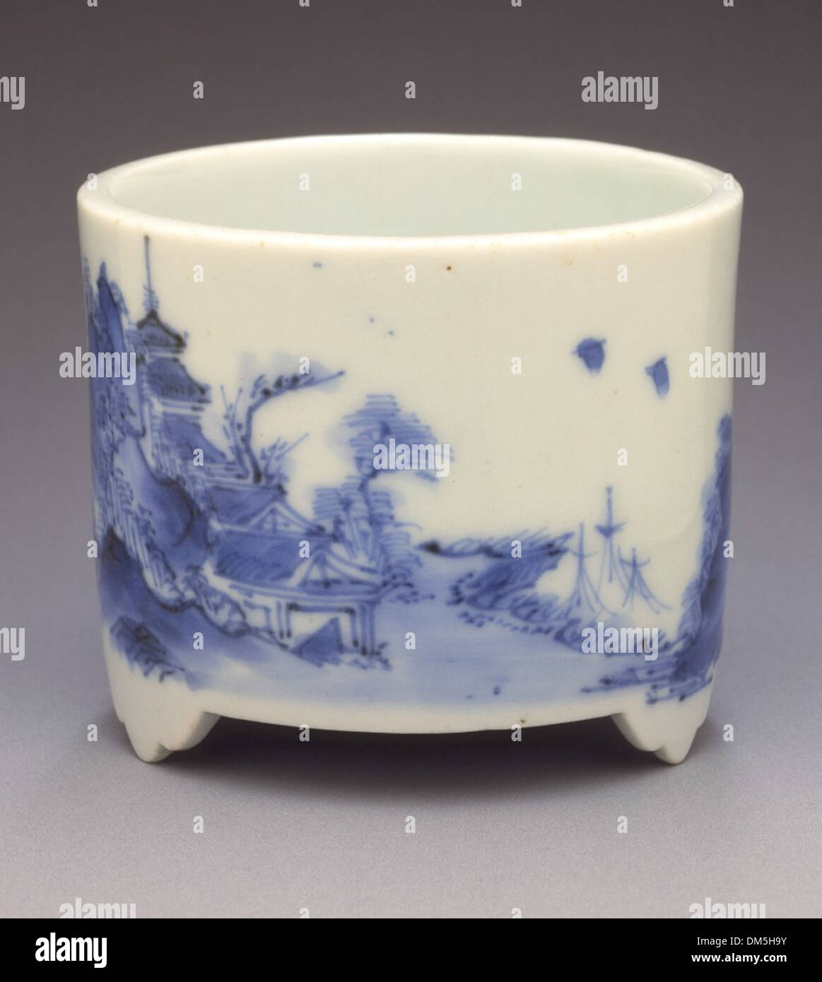 This cylindrical censer, known as a koro, features a landscape design ...