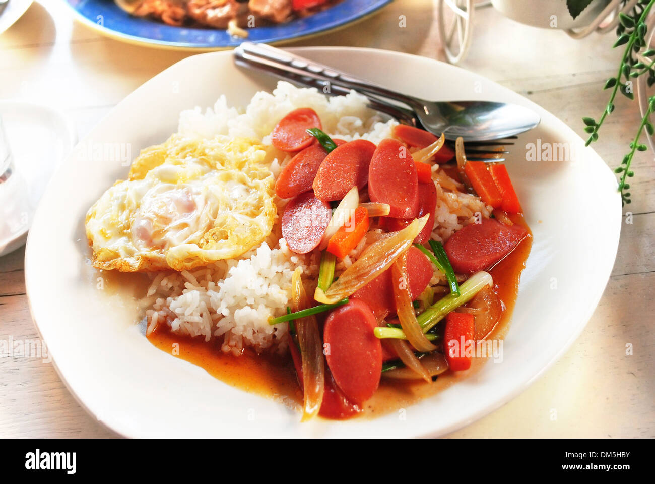 Breakfast fried rice with hot dog, fried egg Stock Photo - Alamy