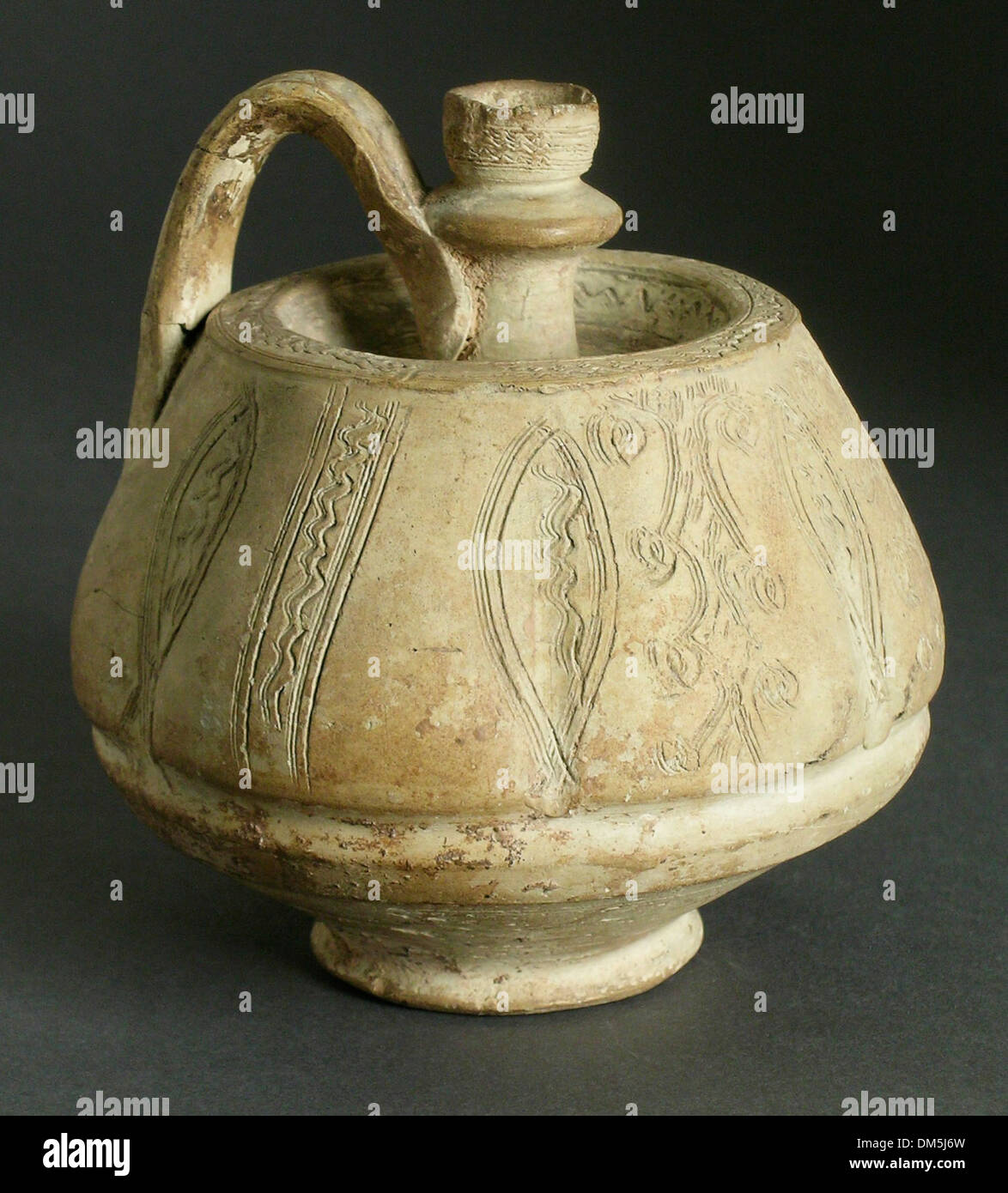 This ewer, a vessel often used for holding liquids, displays intricate ...