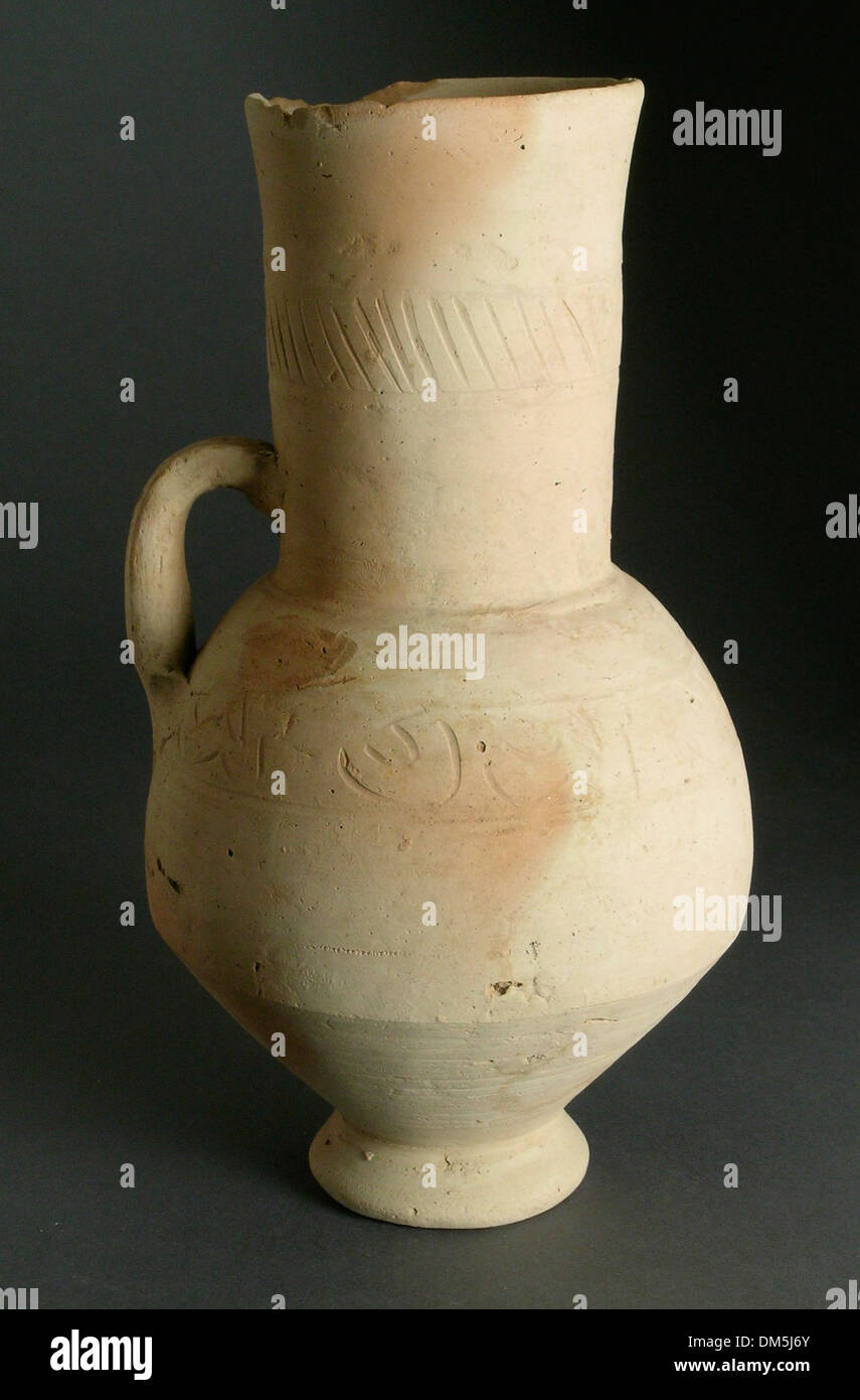 This ewer is a type of ceramic vessel, often used for holding and ...