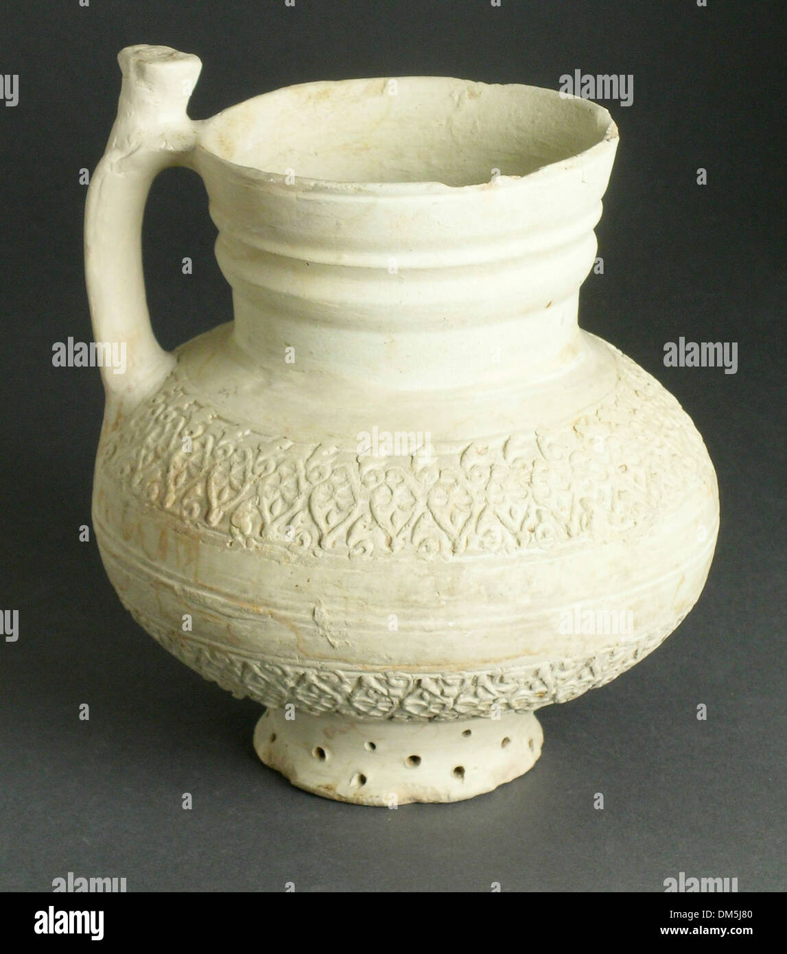 This ewer, an ancient vessel designed for holding and pouring liquids ...