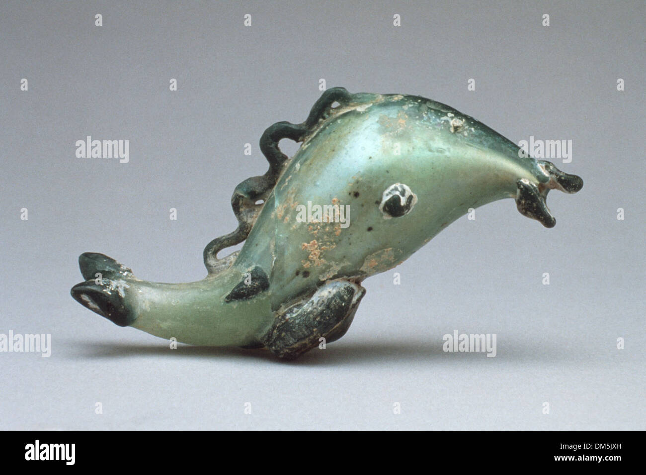 This representation of a dolphin captures the fluid motion and elegance ...