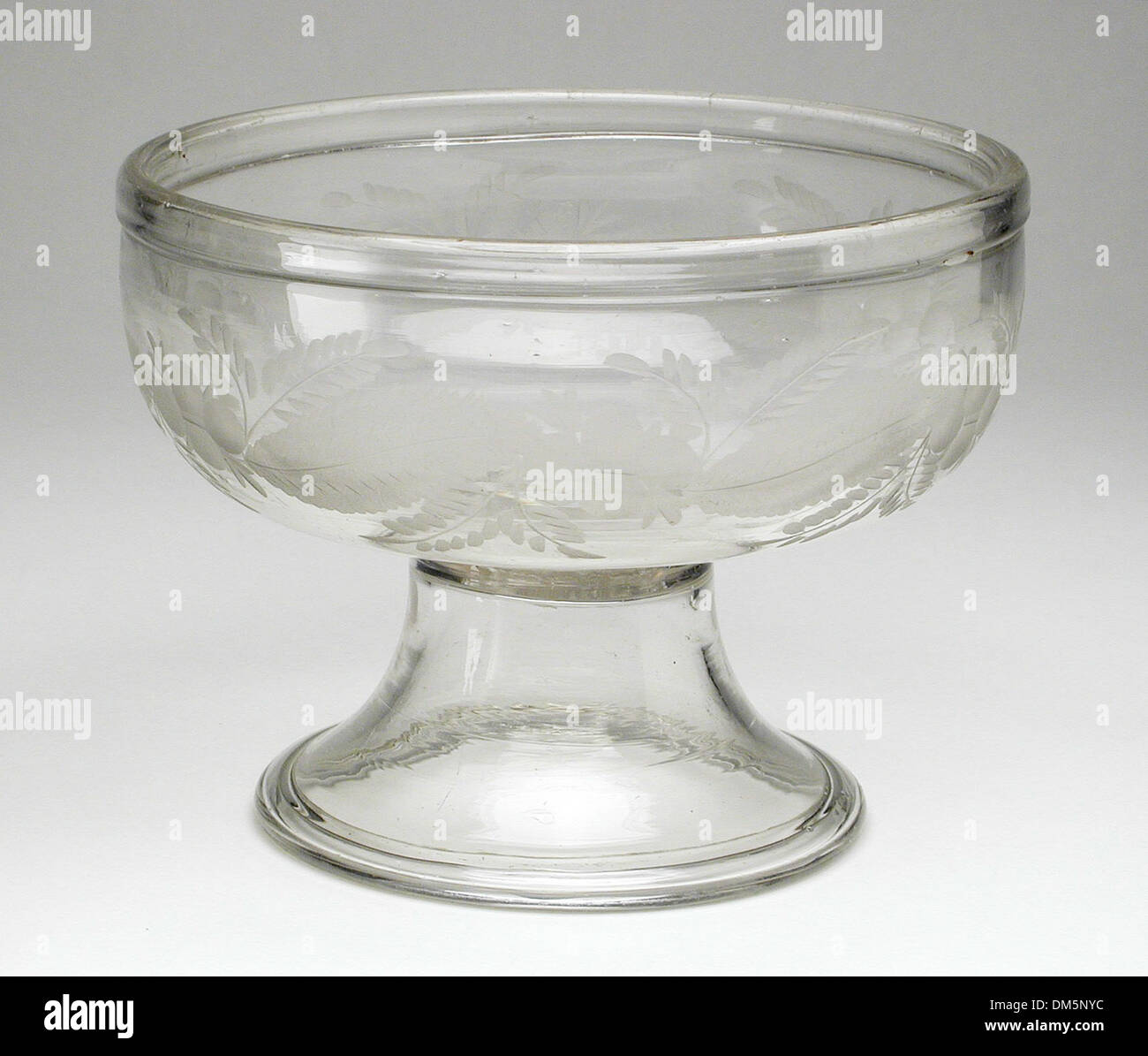 This footed bowl is an example of finely crafted pottery. It features a ...