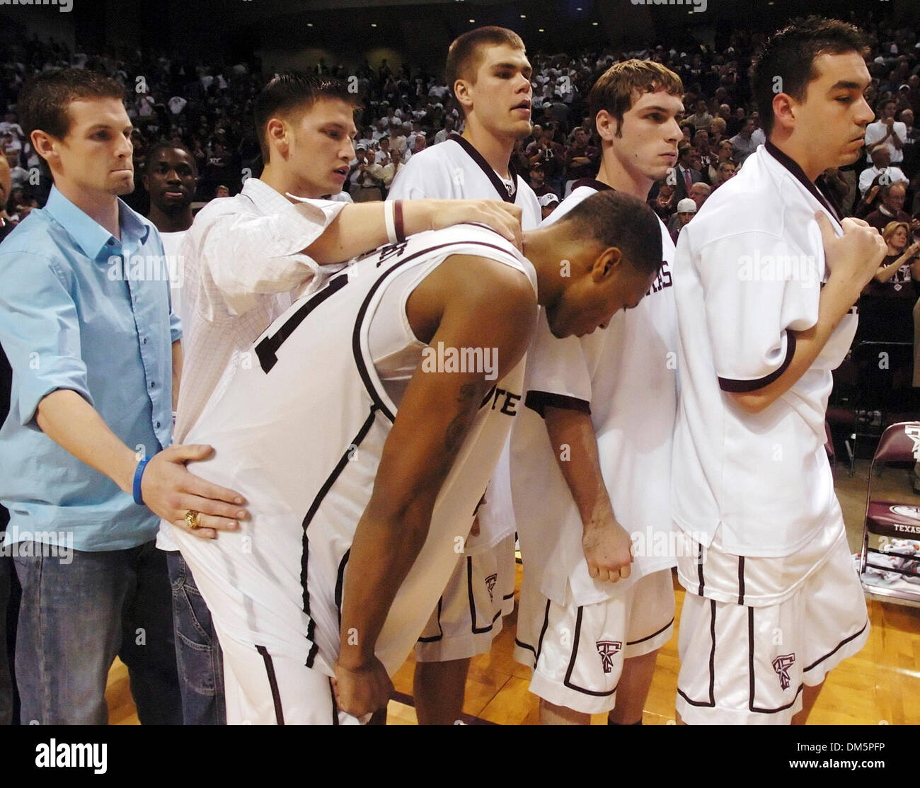 Mar 23, 2005; College Station, TX, USA; Antoine Wright is comforted by ...