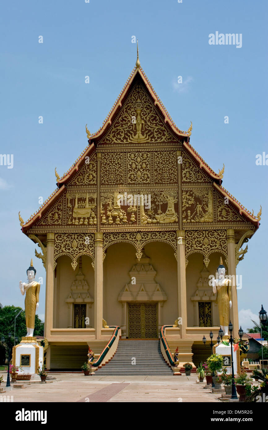 A beautiful pagoda stands on the grounds of Pha That Luang Buddhist temple, the national symbol ...