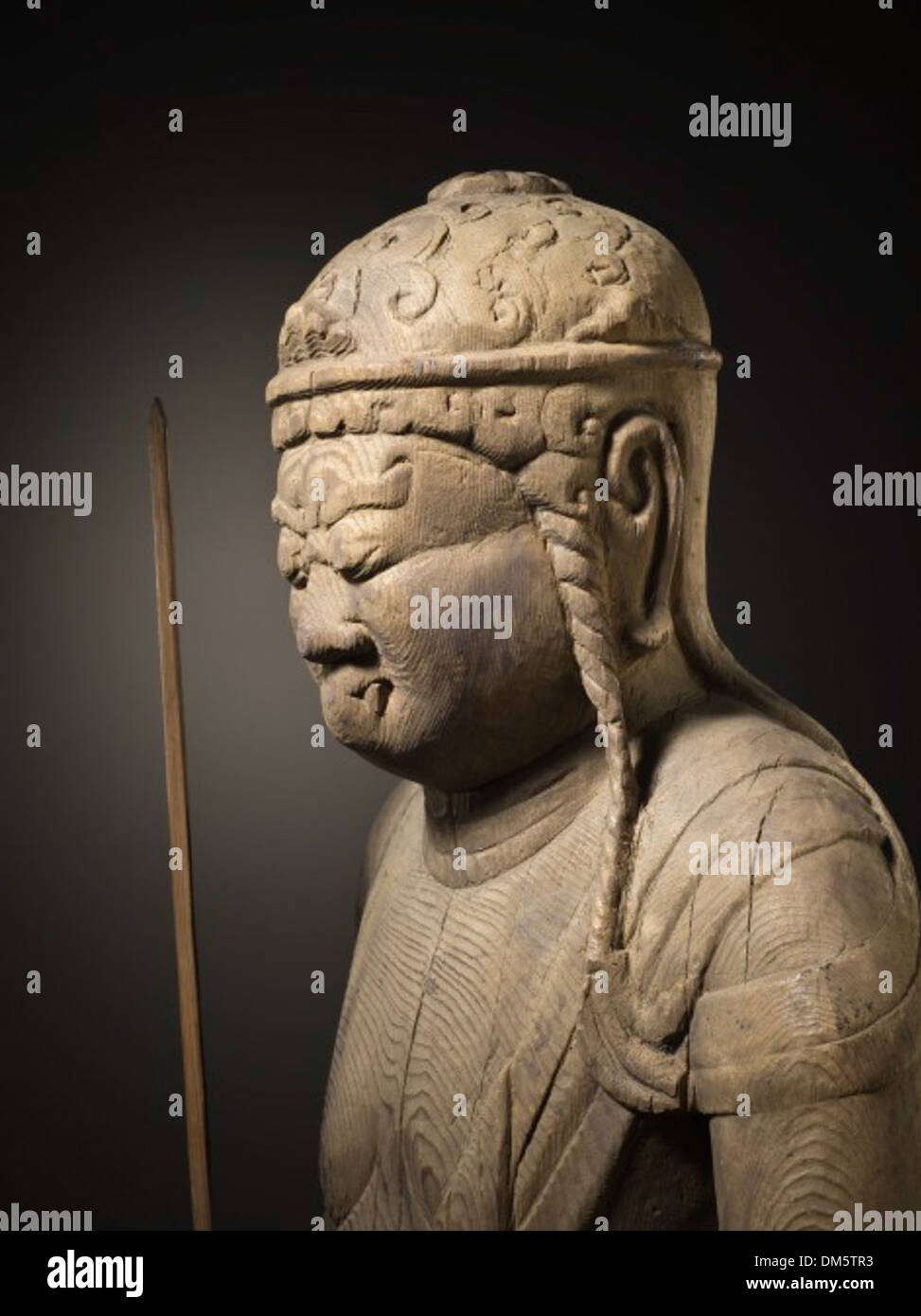 This sculpture represents Fudo Myoo, a figure in Japanese Buddhism ...