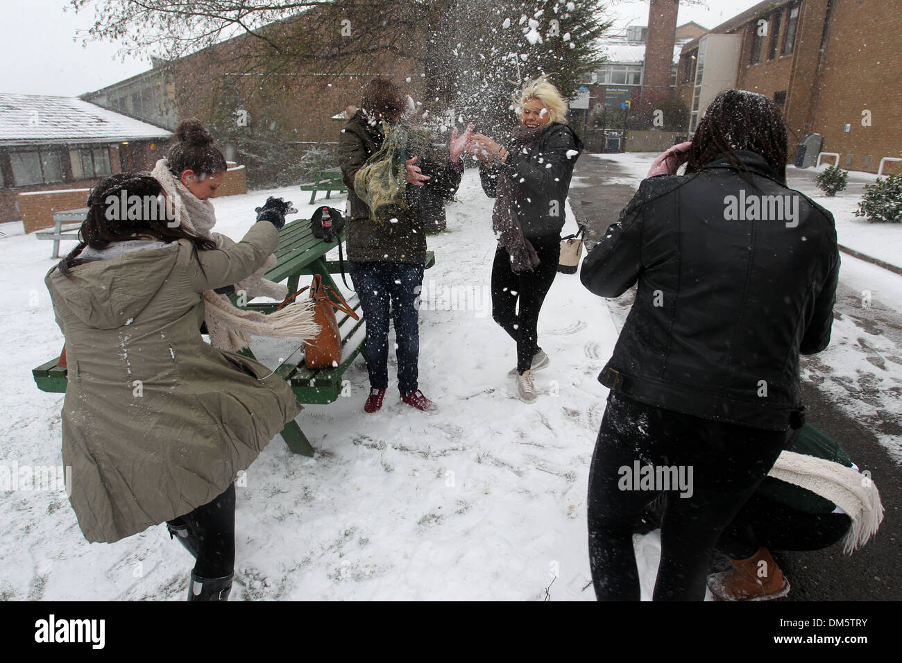 Six students pictured having a snowball fight in heavy snow in Brighton ...
