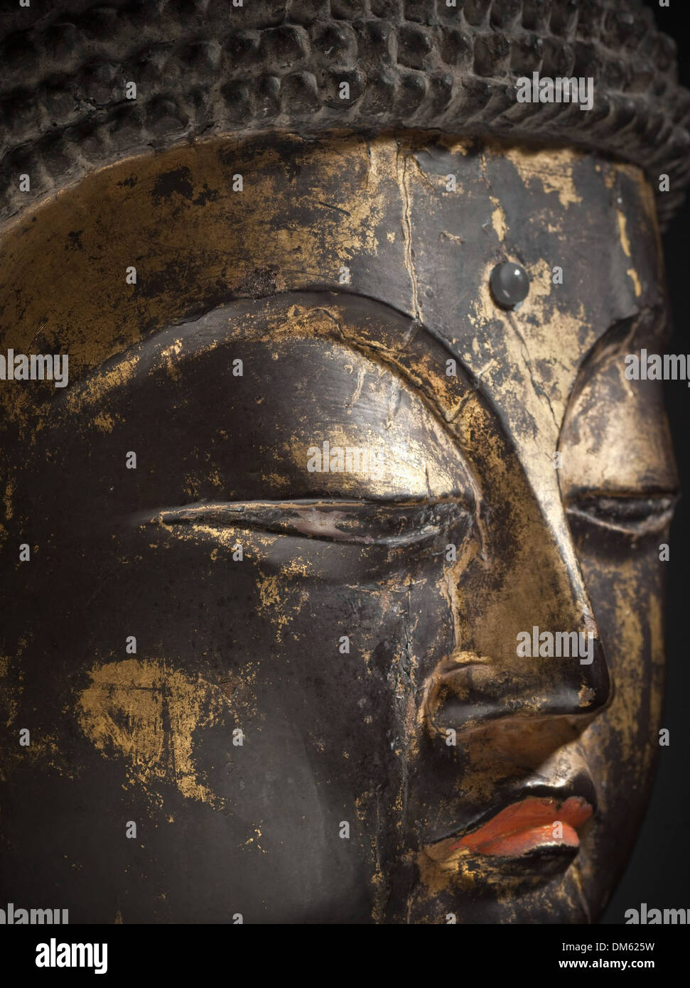 This sculpture represents the head of Buddha, symbolizing peace and ...