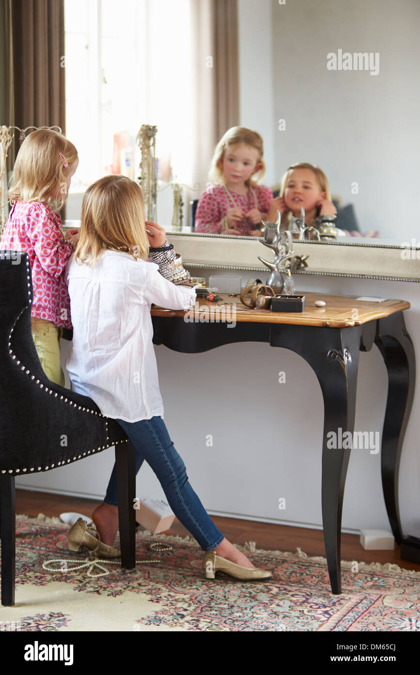 Child dressing up jewelry hi-res stock photography and images - Alamy