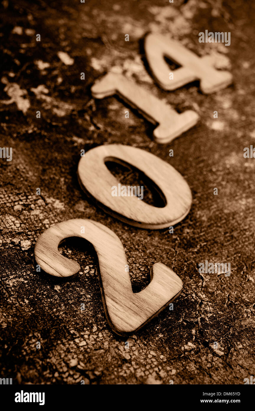 wooden numbers forming number 2014, as the new year, on an old and ...