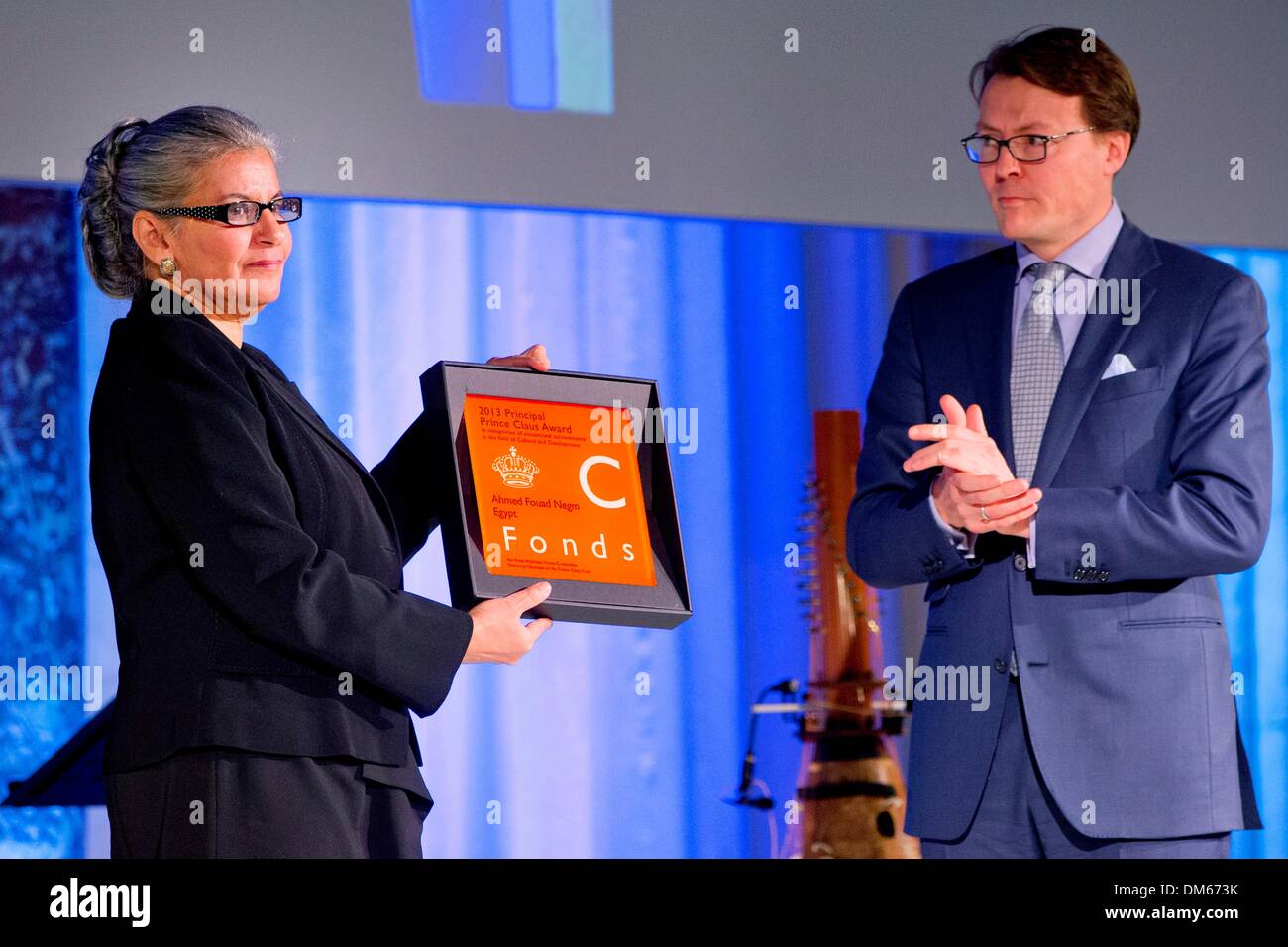 Amsterdam, The Netherlands. 11th Dec, 2013. Prince Constantijn hands ...