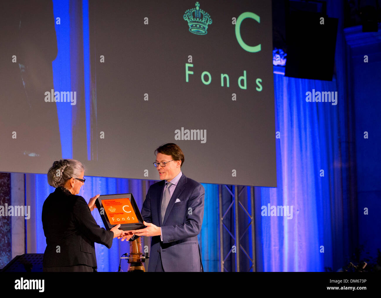 Amsterdam, The Netherlands. 11th Dec, 2013. Prince Constantijn hands ...