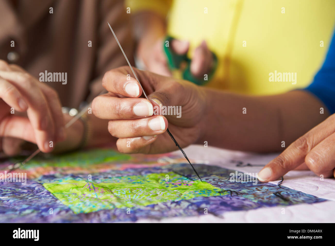 Patchwork quilt woman hand hi-res stock photography and images - Alamy