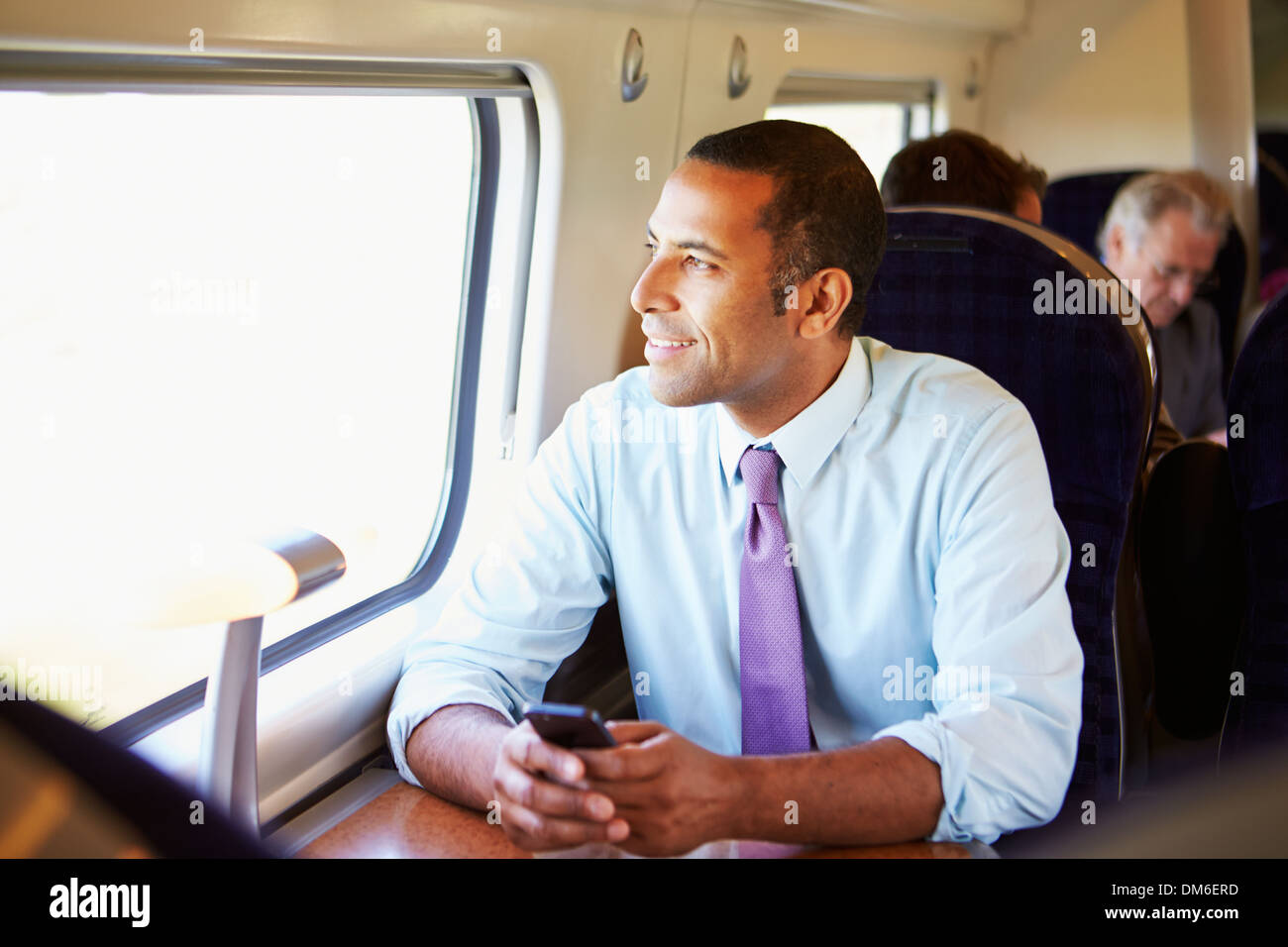 African american businessman using mobile hi-res stock photography and ...