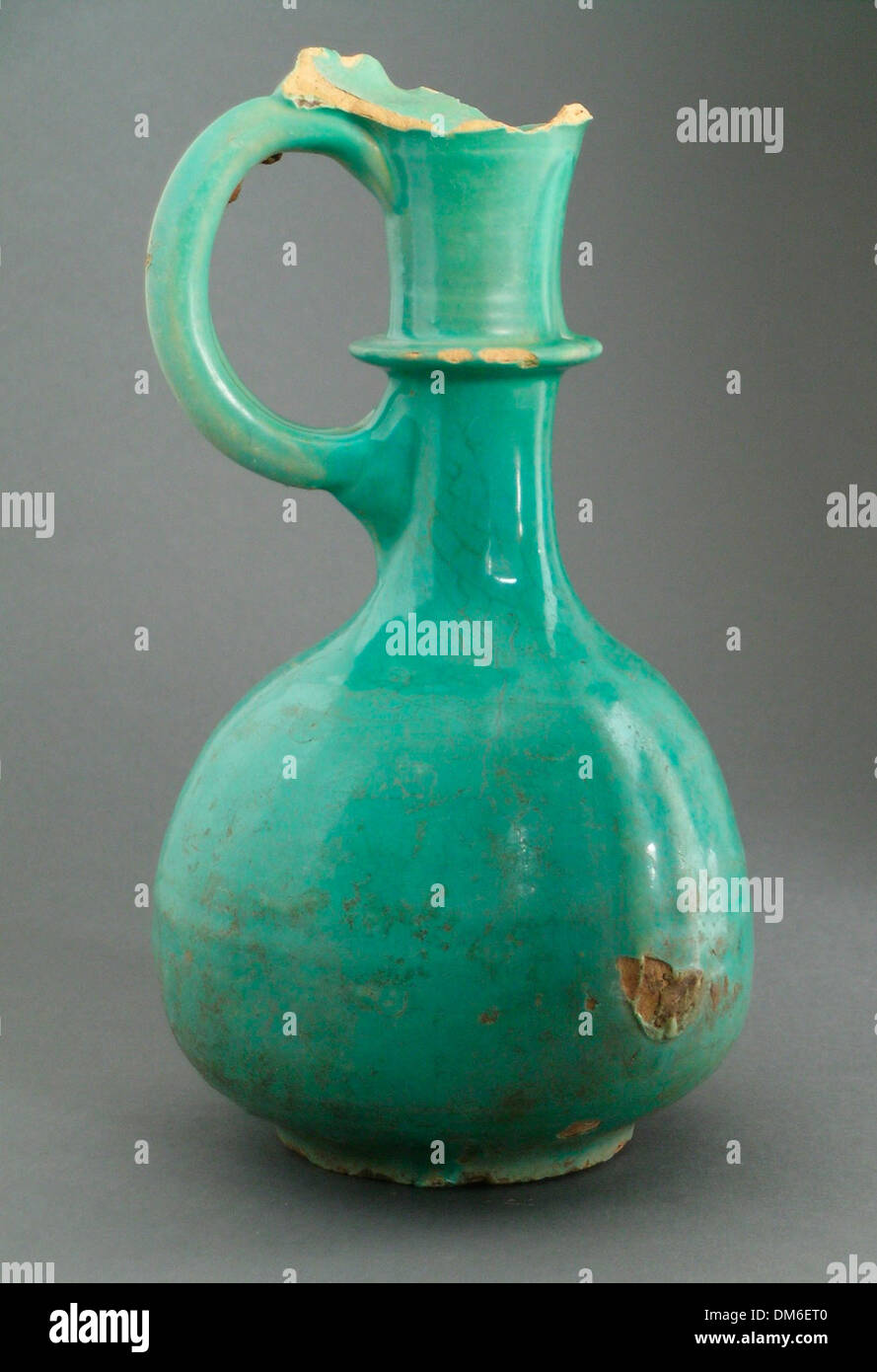 This jug, a classic example of ceramic ware, showcases traditional ...