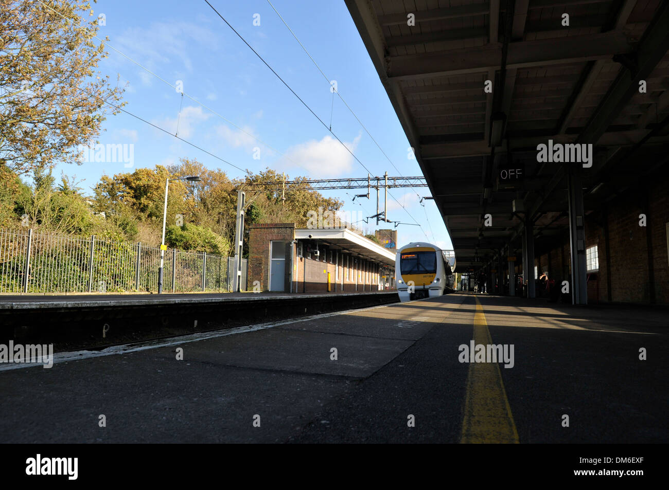 A C2C National Express train arrives at a platform at Chalkwell station ...