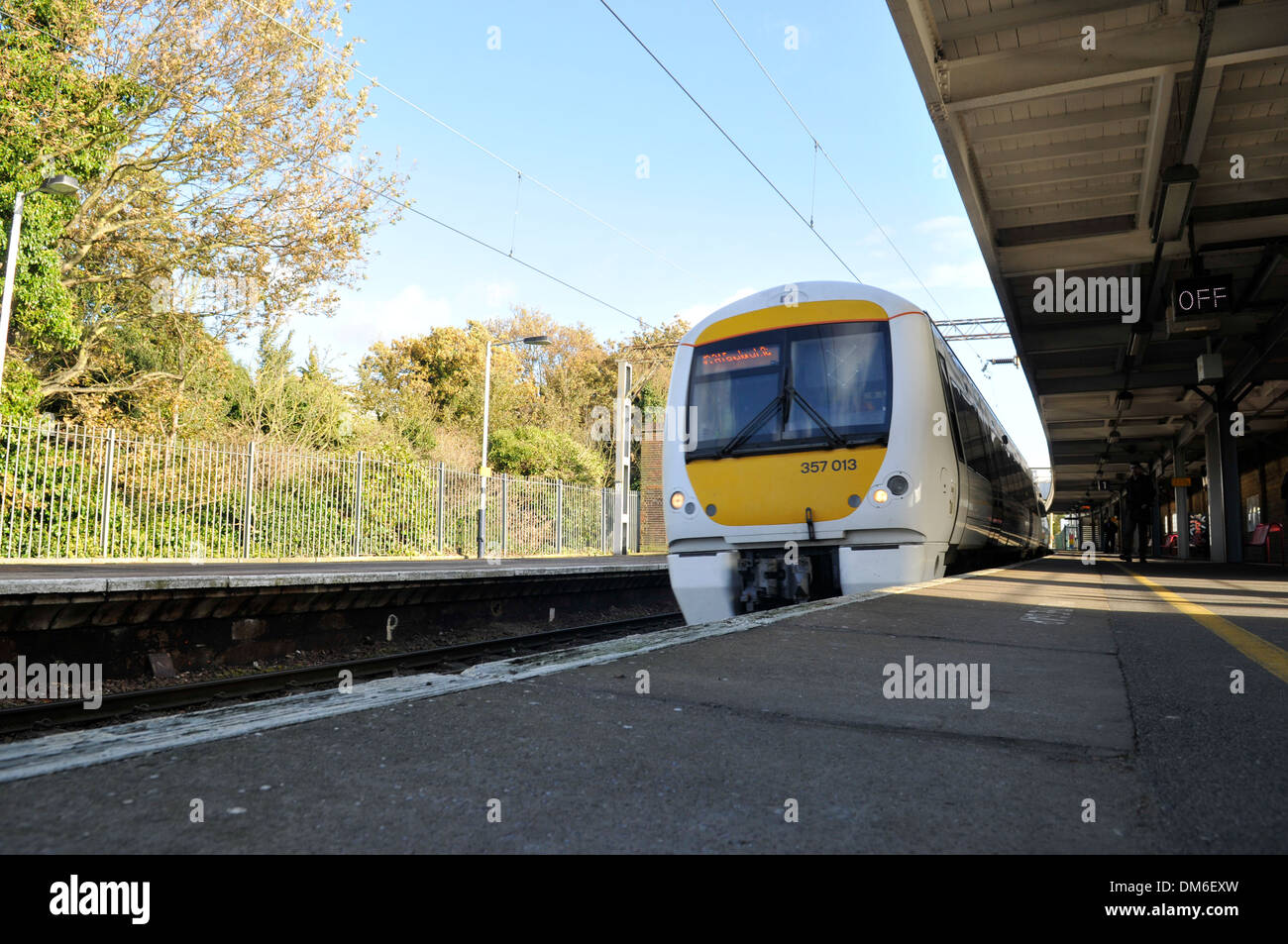 A C2C National Express train arrives at a platform at Chalkwell station ...