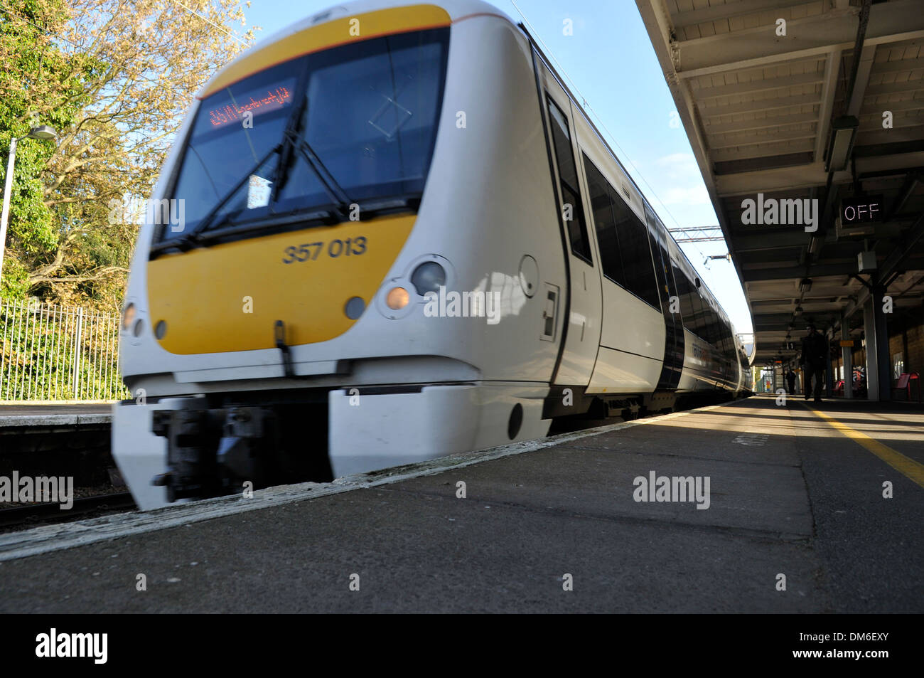 A C2C National Express train arrives at a platform at Chalkwell station ...
