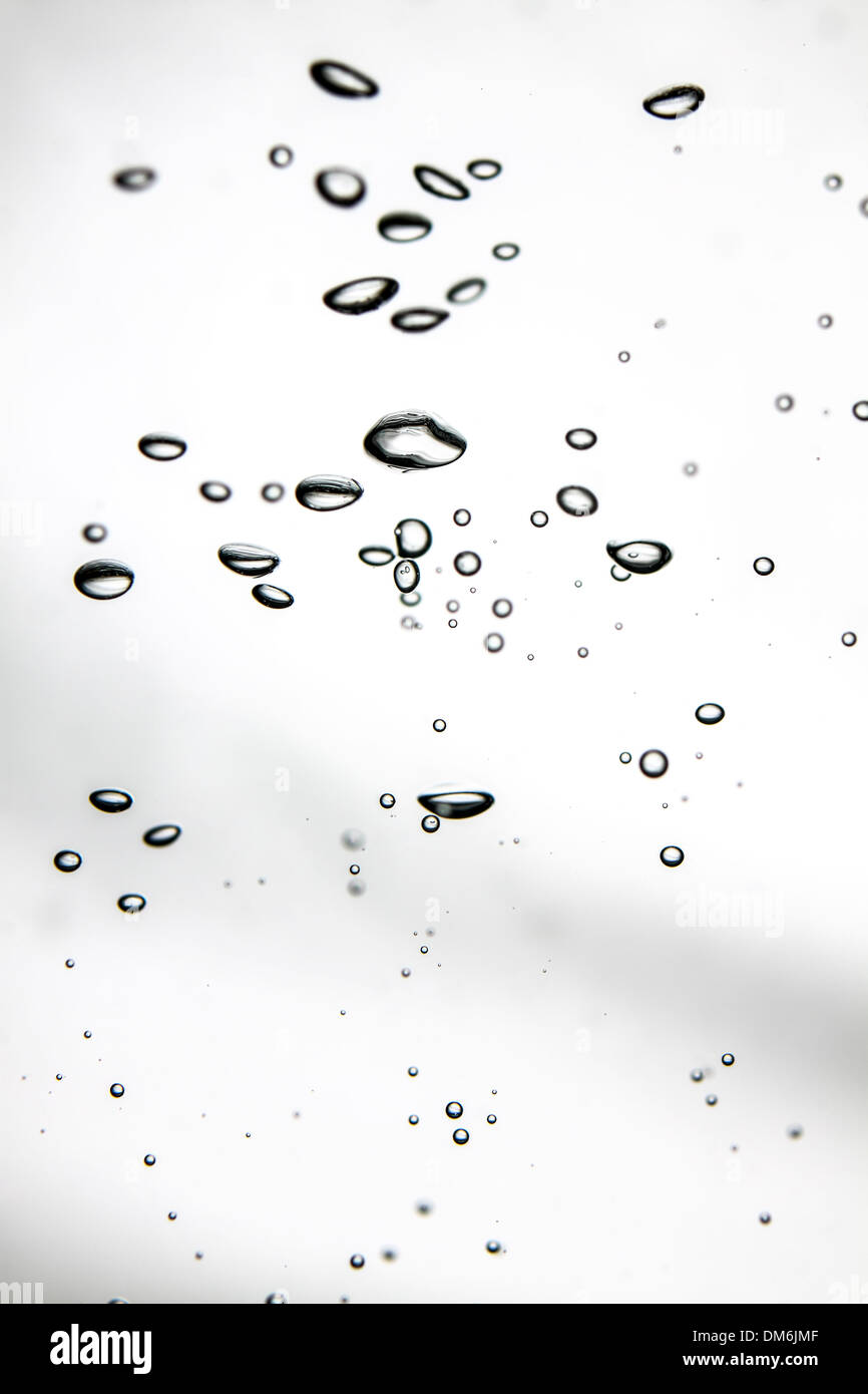 bubbles of oxygen rising through clear water Stock Photo - Alamy