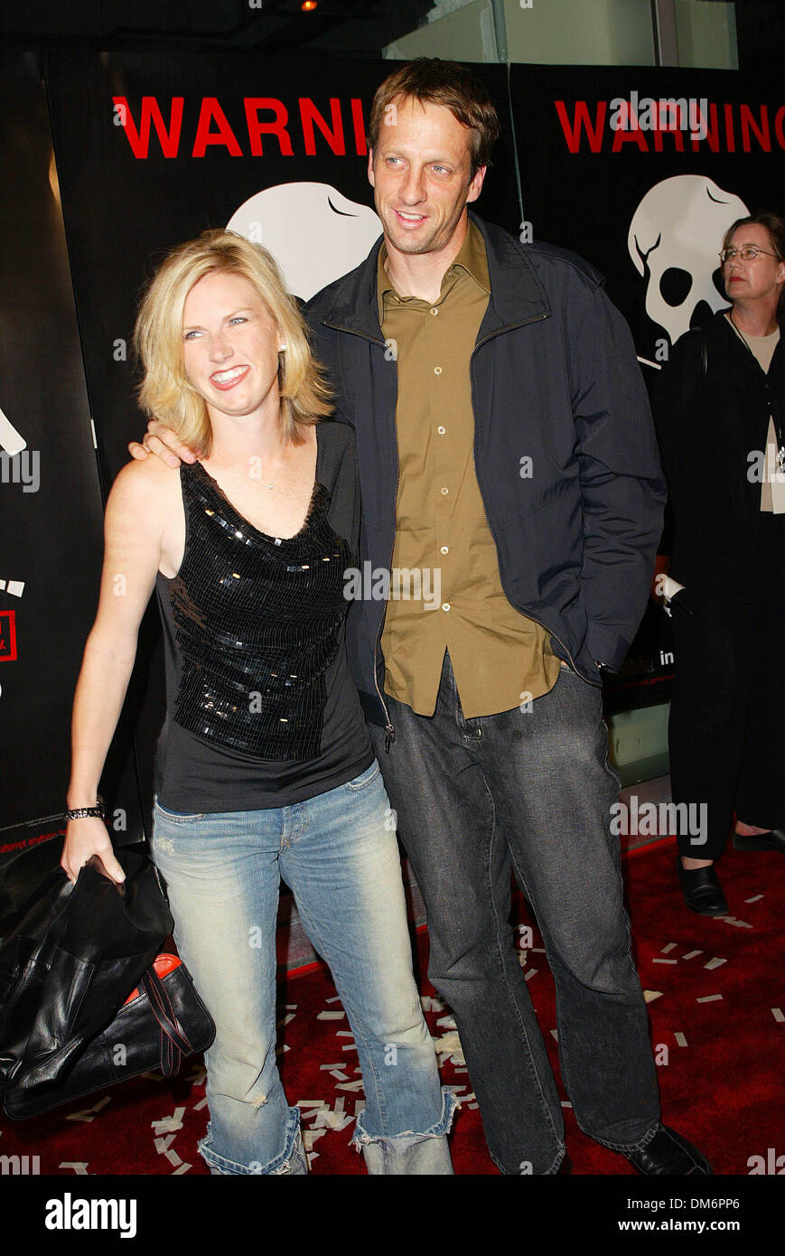 Oct. 21, 2002 - Hollywood, CALIFORNIA - TONY HAWK AND WIFE ..K26842FB ...