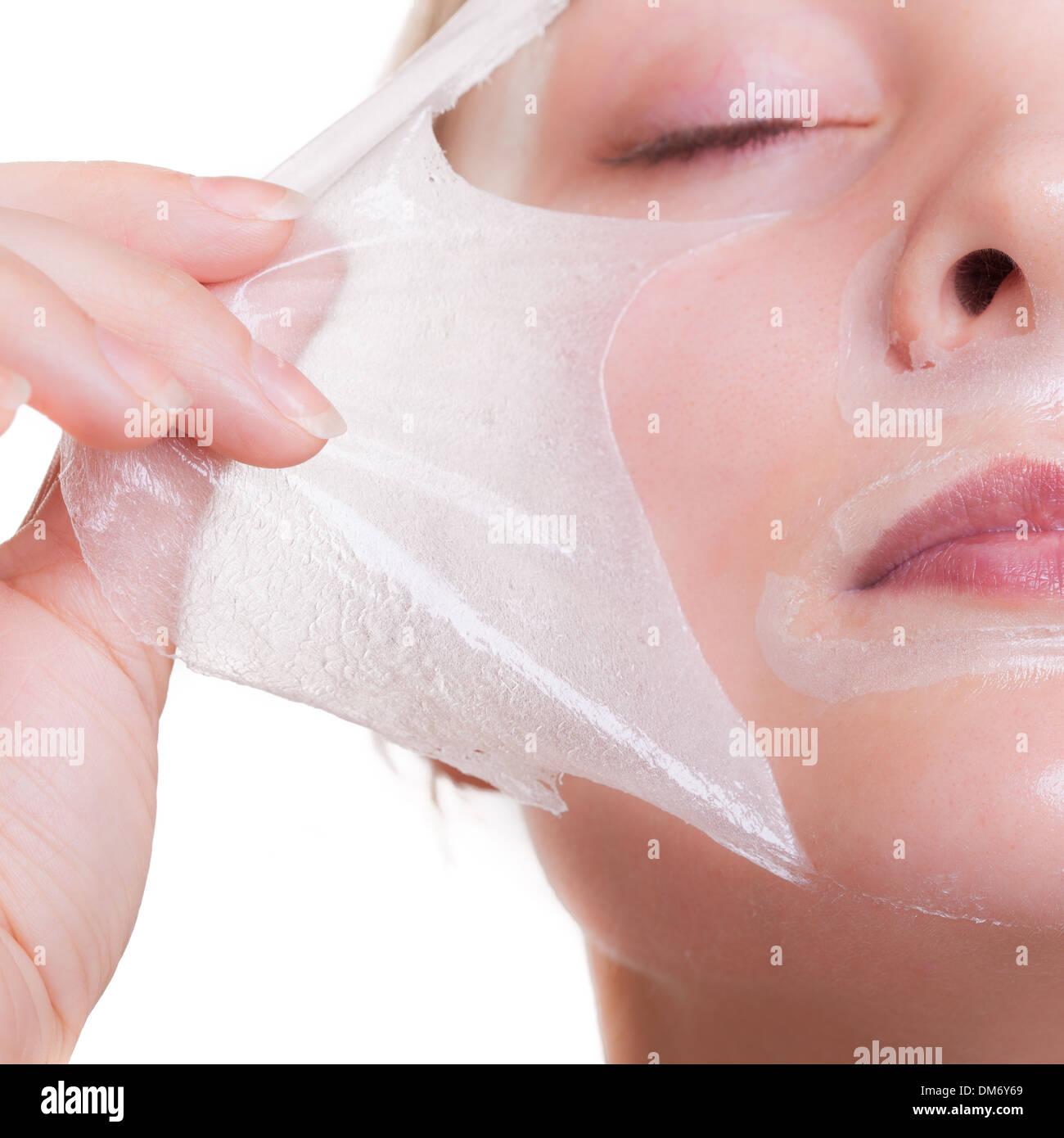 Portrait of blond girl young woman in facial peel off mask. Peeling ...