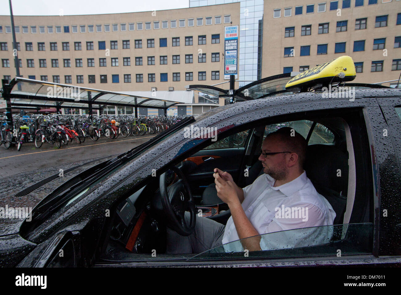 taxi driver in Holland Stock Photo - Alamy