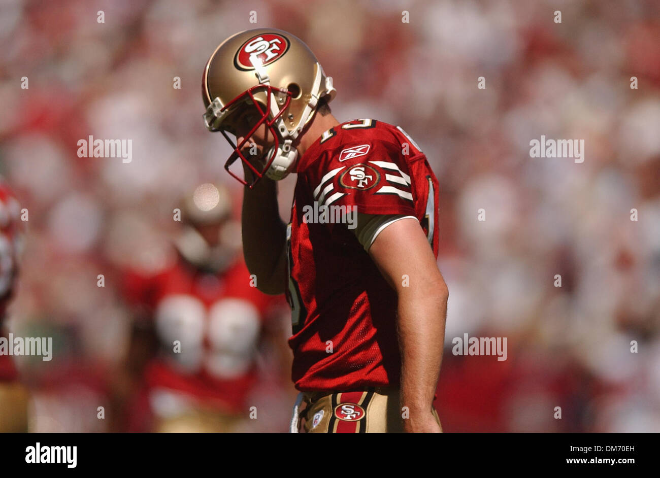 San Francisco 49ers quarterback Tim Rattay leaves the field after being ...