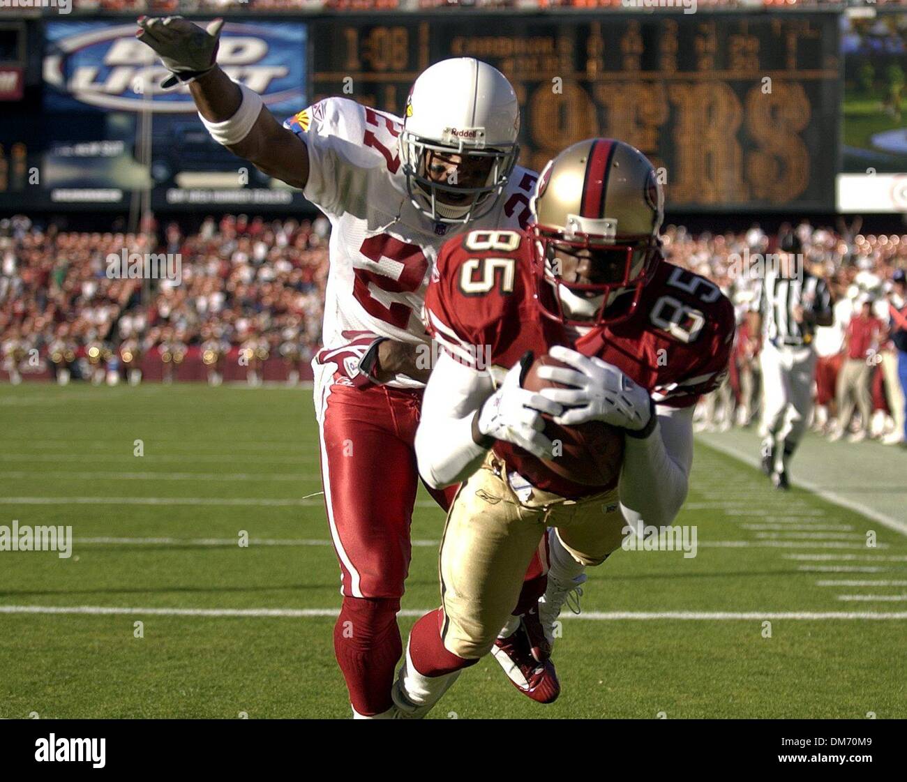 San Francisco 49er Brandon Lloyd catches a touchdown pass in the end ...