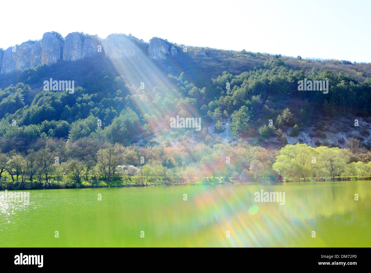 Ray of sunshine from the mountain lake. Mangup-Kale, Crimea, Ukraine ...