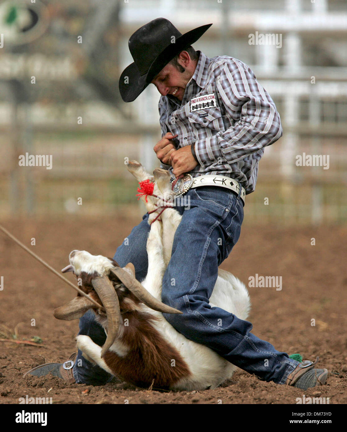 Aug 06, 2005; San Angelo, TX, USA; KINNEY HARRELL, of Brady, ties the ...