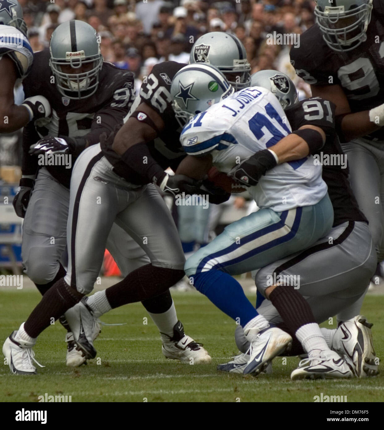 Oct 02, 2005; Oakland, CA, USA; NFL Football: Oakland Raiders defenders ...