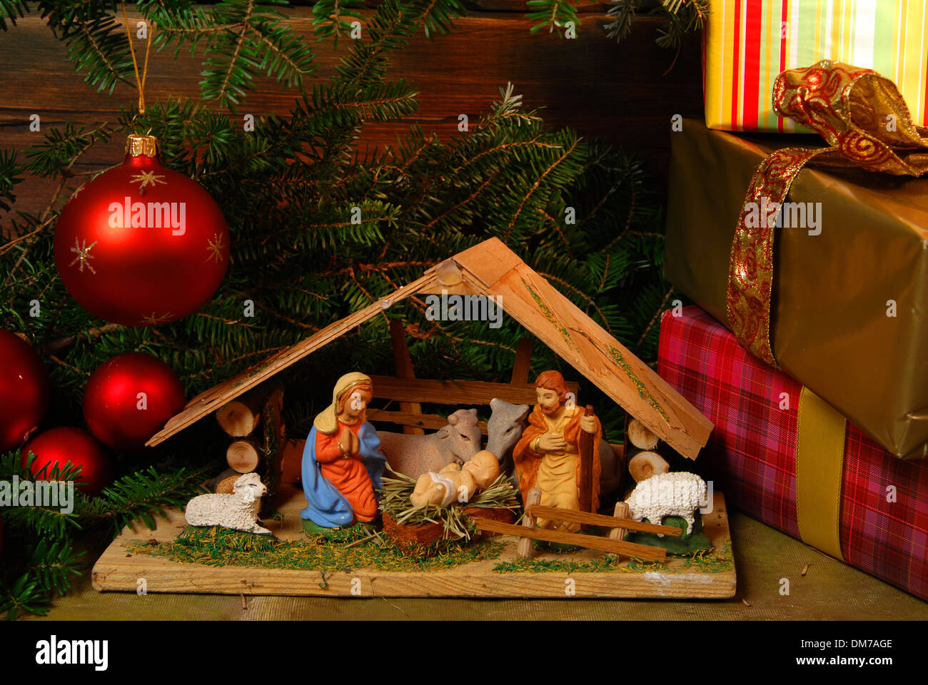 Nativity New Year's under the Christmas tree with ornaments Stock Photo ...