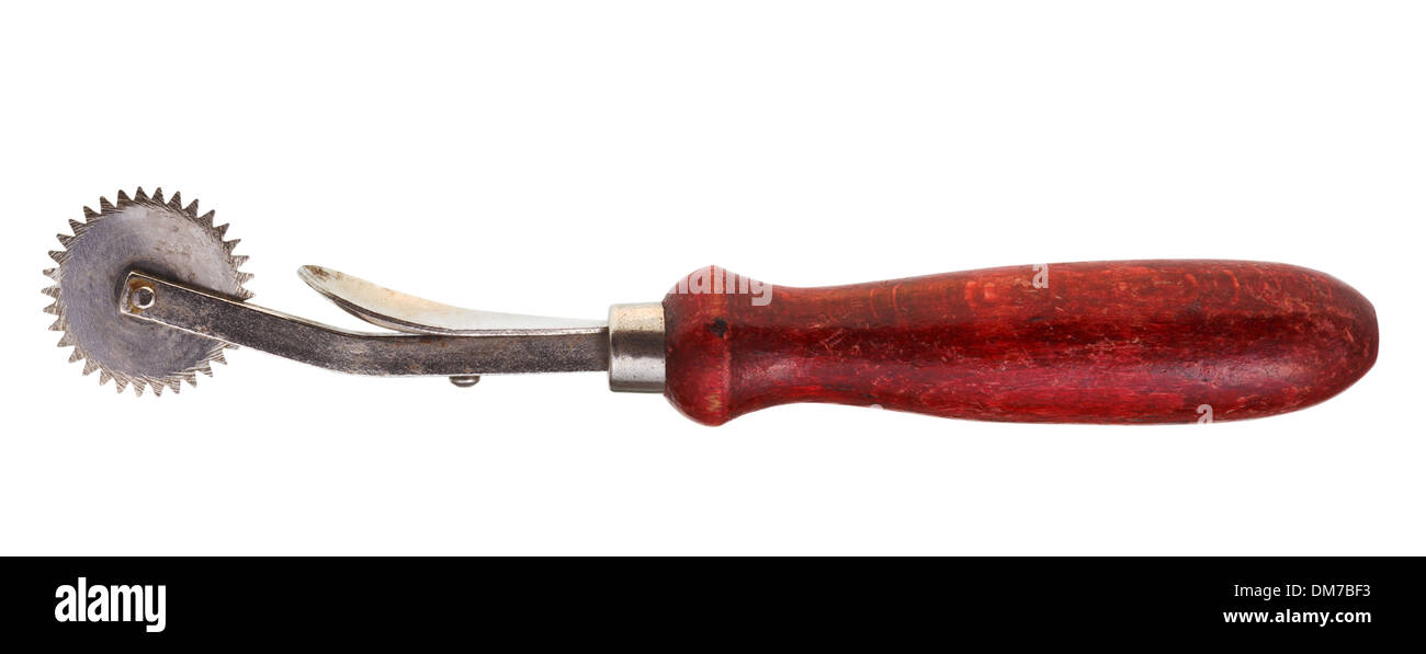 vintage tracing wheel with red wooden handle isolated on white ...