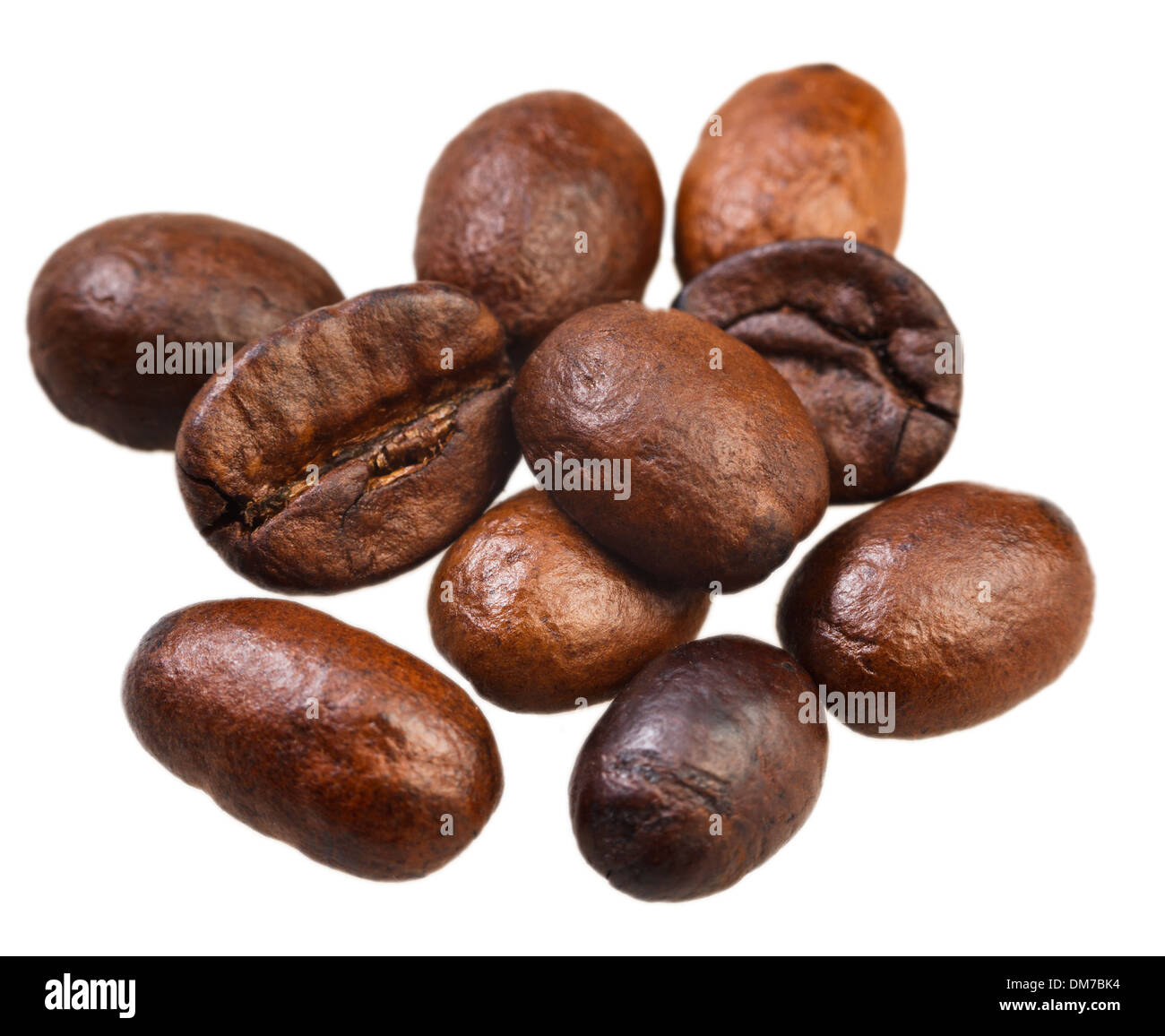 many roasted coffee beans isolated on white background Stock Photo - Alamy