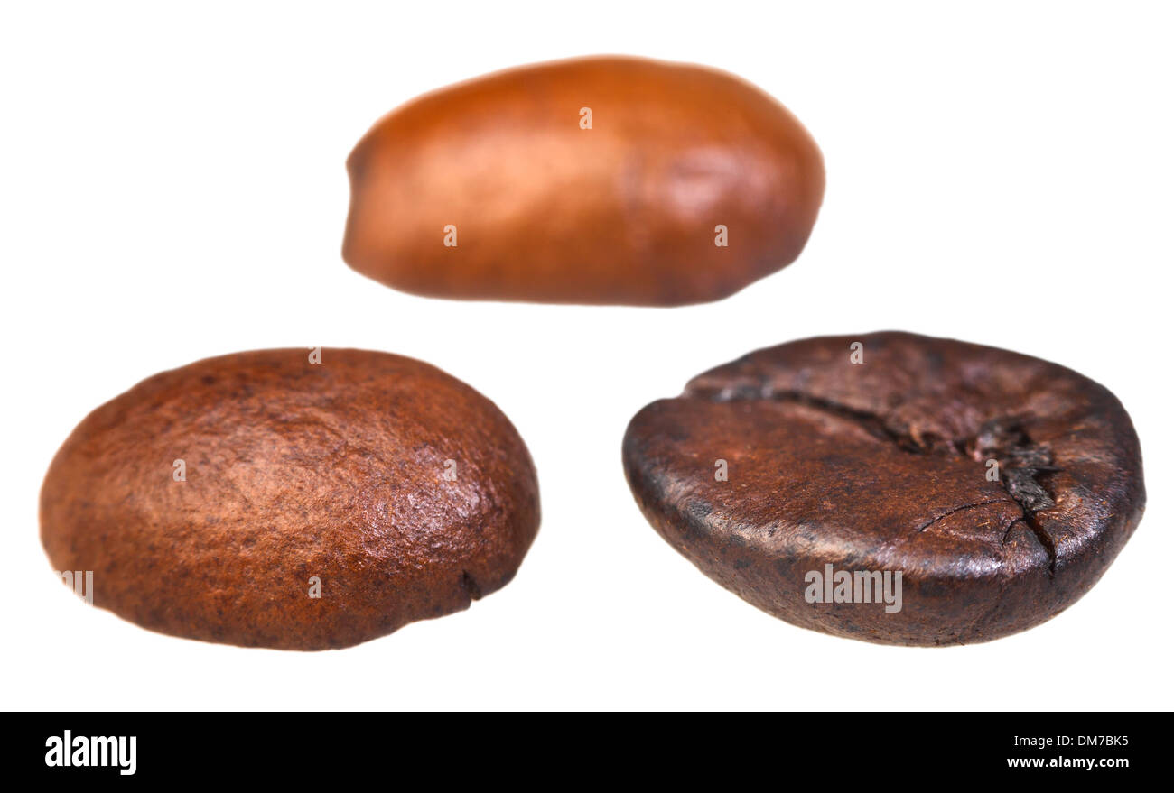 three roasted coffee beans isolated on white background Stock Photo - Alamy