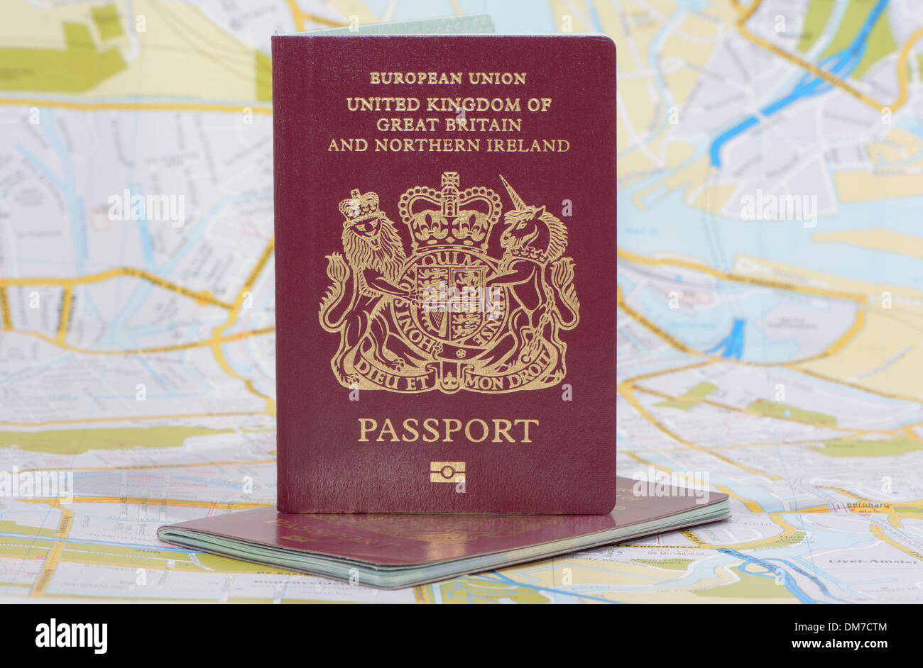 Two United Kingdom Passports On A Map Stock Photo - Alamy