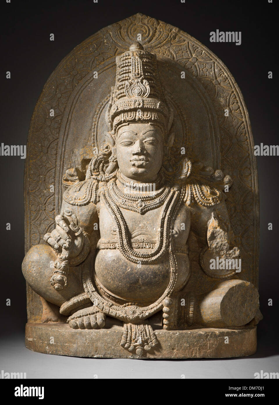 This artwork features Kubera, the God of Riches, depicted in ...