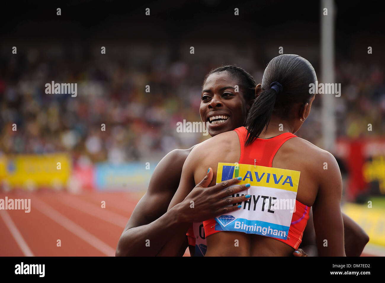 Christine Ohurougu congratulating Rosemarie Whyte after Women's 400m ...