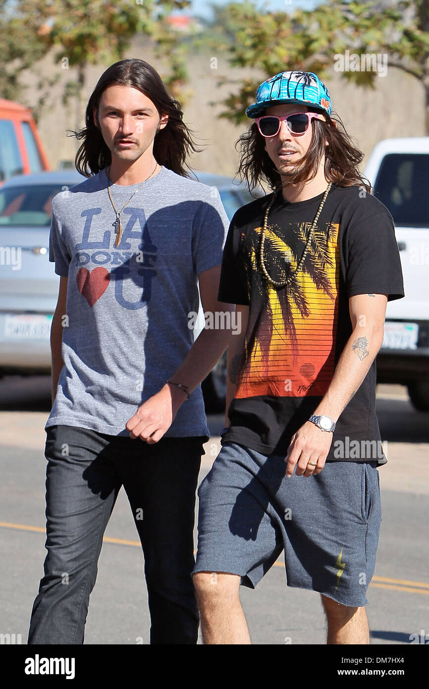 Cisco Adler (right) and a male companion arriving at annual labor ...