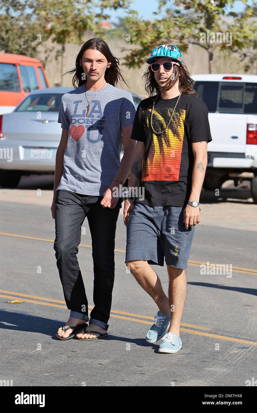 Cisco Adler (right) and a male companion arriving at annual labor ...